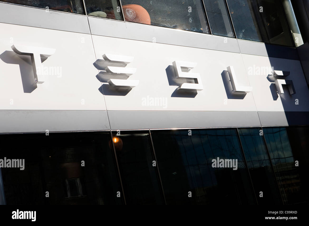 A Tesla all electric car dealership showroom Stock Photo - Alamy