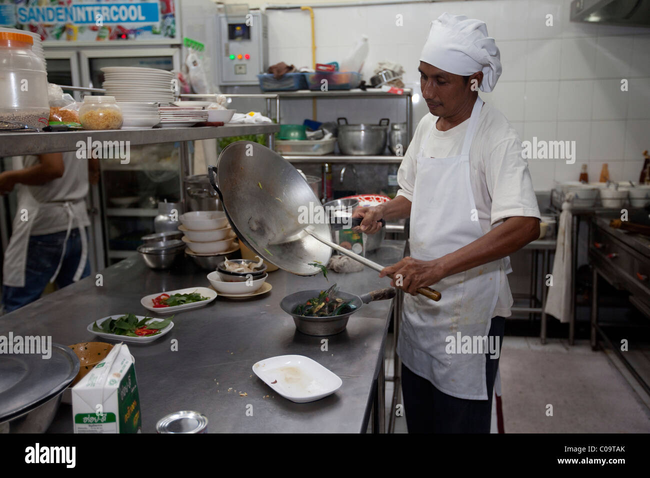 Thai chefs in a cook-shop in Rawai, Phuket, Thailand, Asia Stock Photo ...