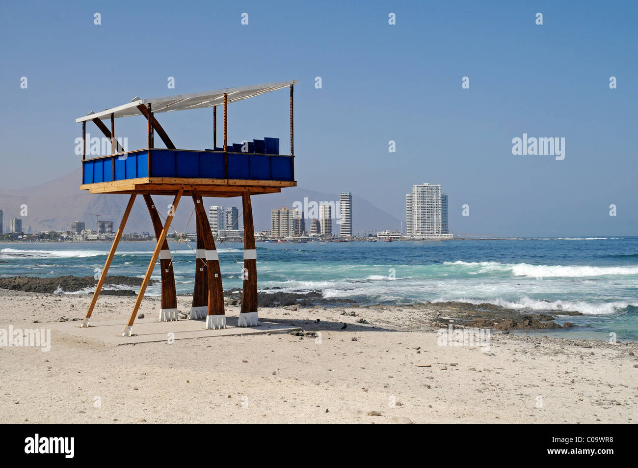 Lookout tower, beach, coast, sea, waves, high-rise buildings, Iquique ...