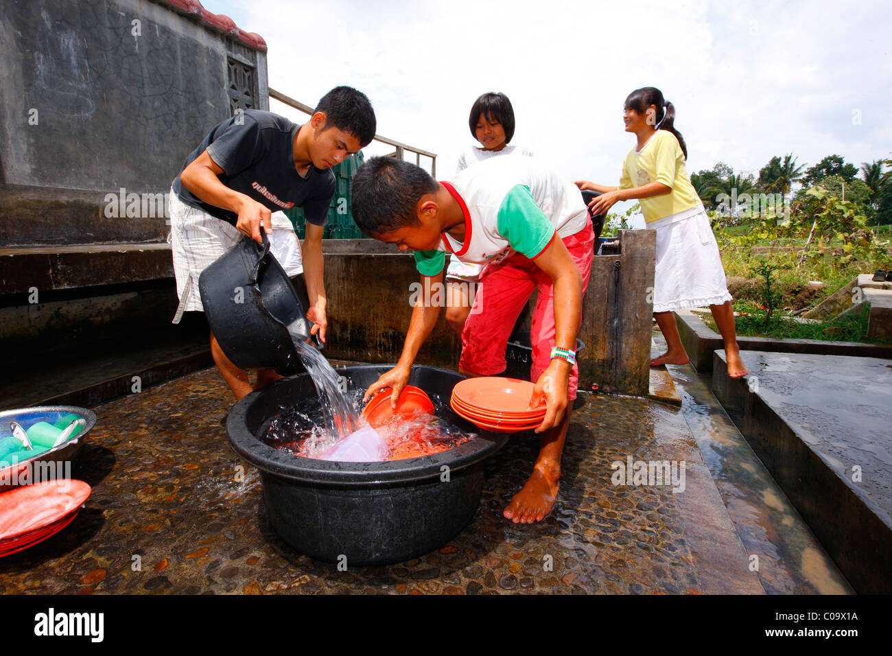 Children doing the dishes, Margaritha children's home, Marihat, Batak ...