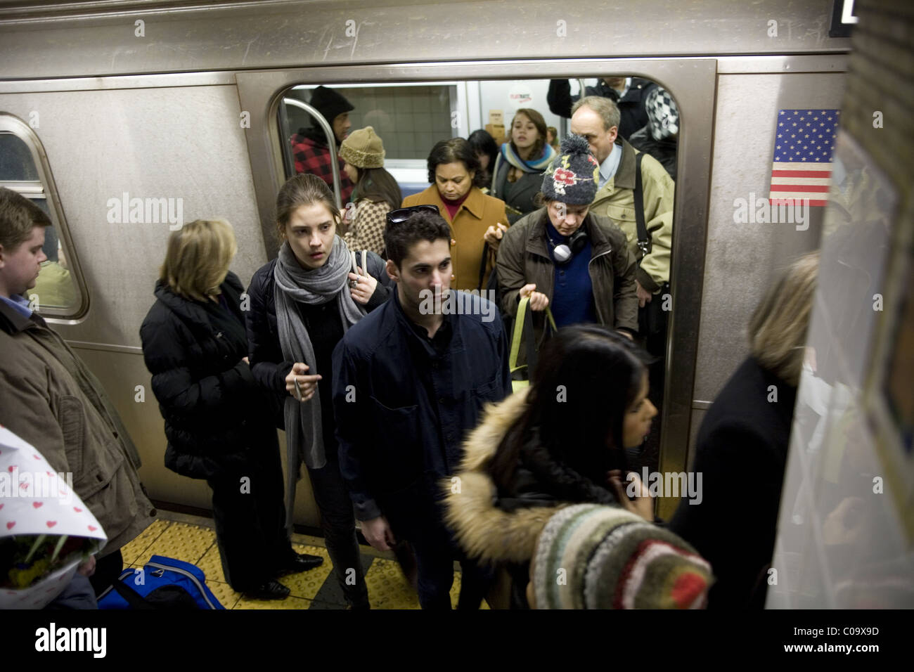 NYC subway system is jammed during the evening rush hour. Grand Central ...