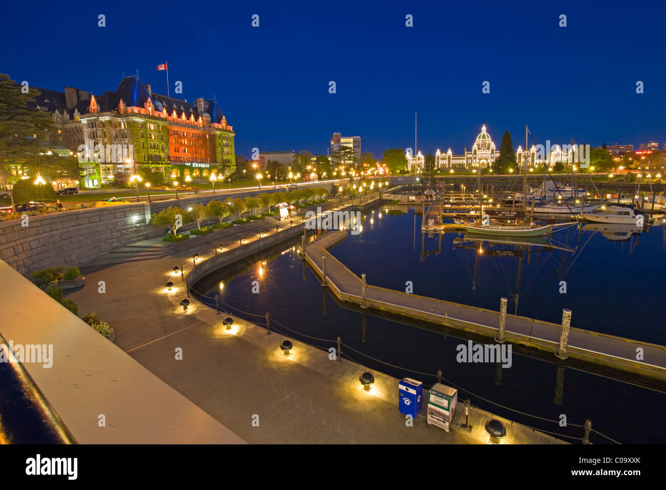 Victoria's Inner Harbour illuminated at twilight with the famous ...