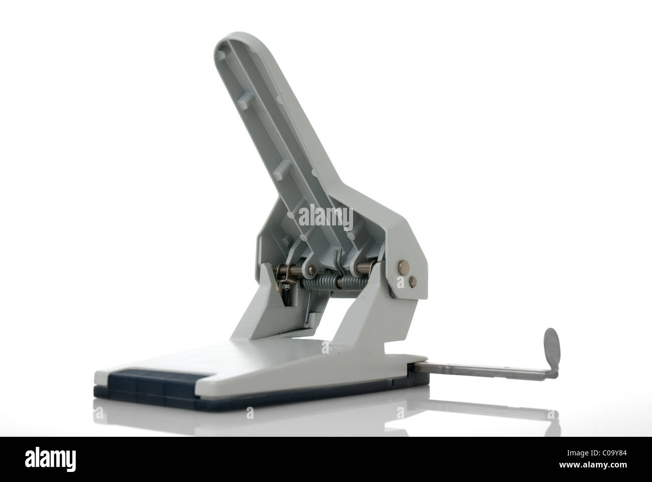 White hole puncher isolated on white background Stock Photo - Alamy