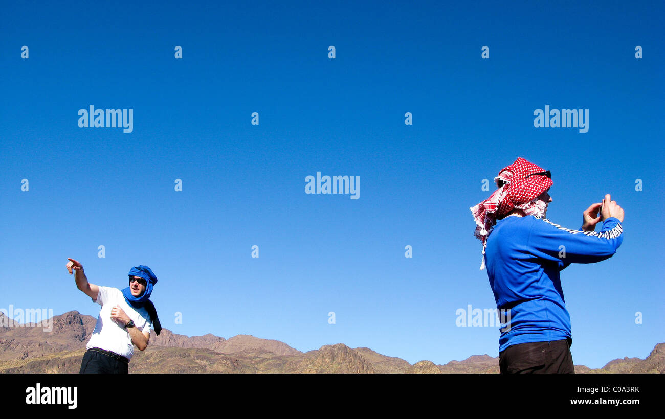 Trekkers wearing traditional Berber head scarves while trekking in the ...