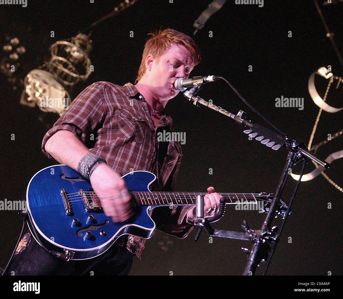 Josh Homme lead singer of Queens Of The Stone Age Play a sold out ...