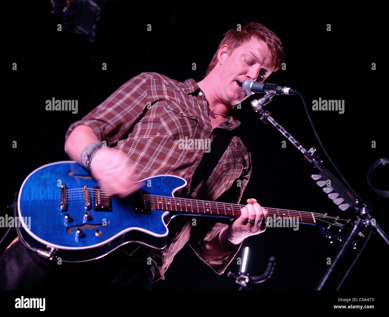 Josh Homme lead singer of Queens Of The Stone Age Play a sold out ...