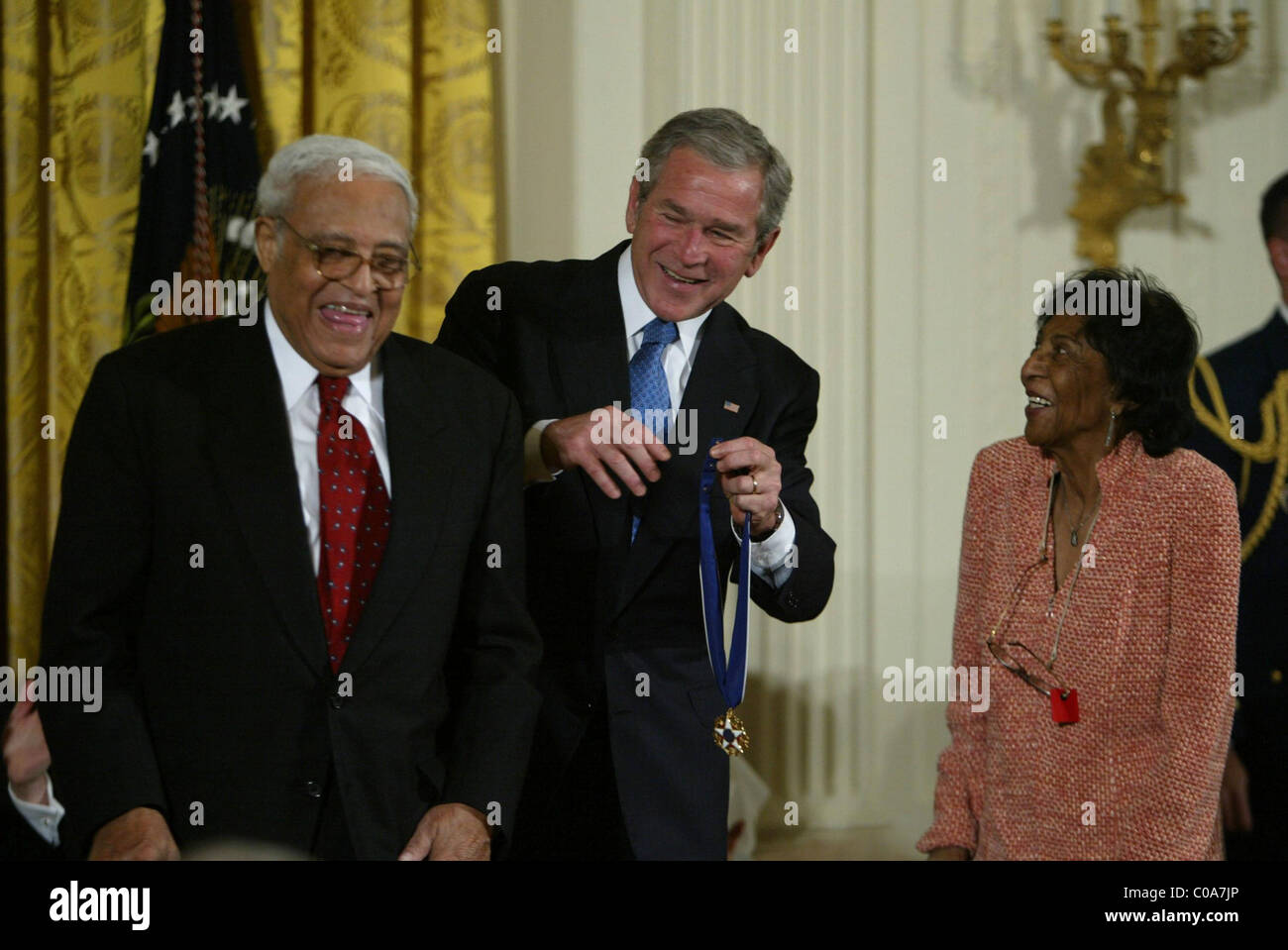 President George Bush awarding US civil rights leader Benjamin Hooks ...