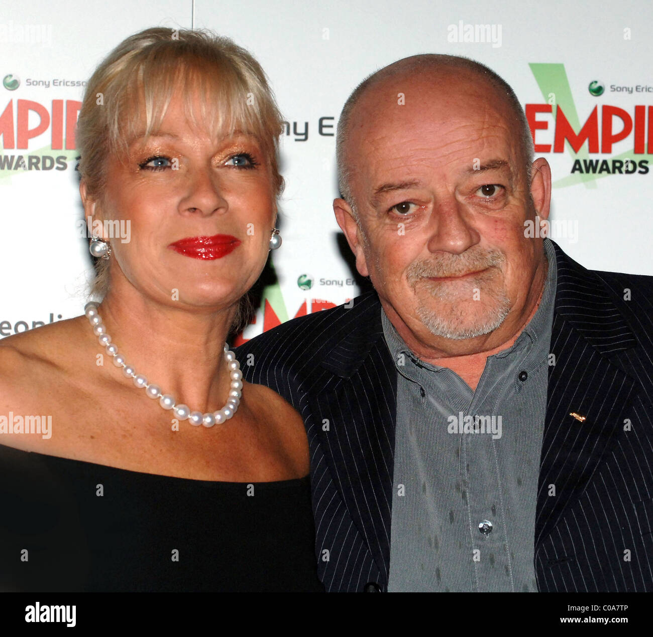 Tim Healy and guest Empire Awards held at the Grosvenor House London ...