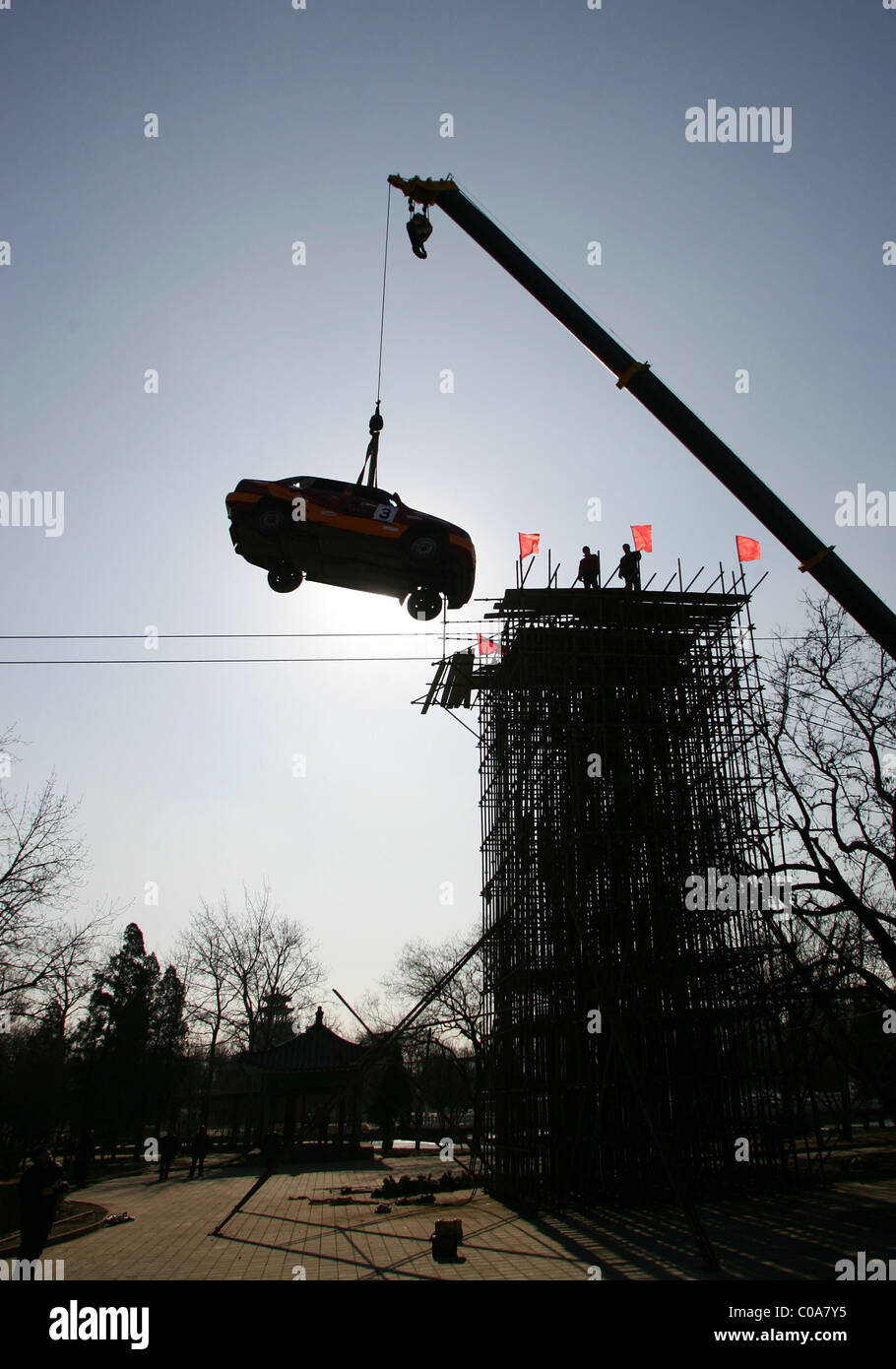 DRIVER TAKES A TIGHT-ROPE ROUTE This mad motorist will drive his car ...