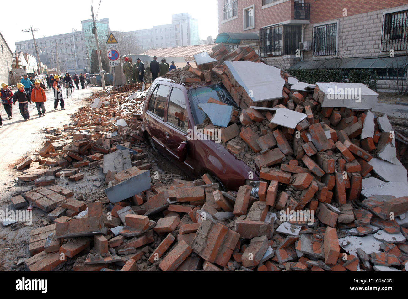 PARKED CAR BURIED UNDER WALL COLLAPSE This car was buried by a wall ...