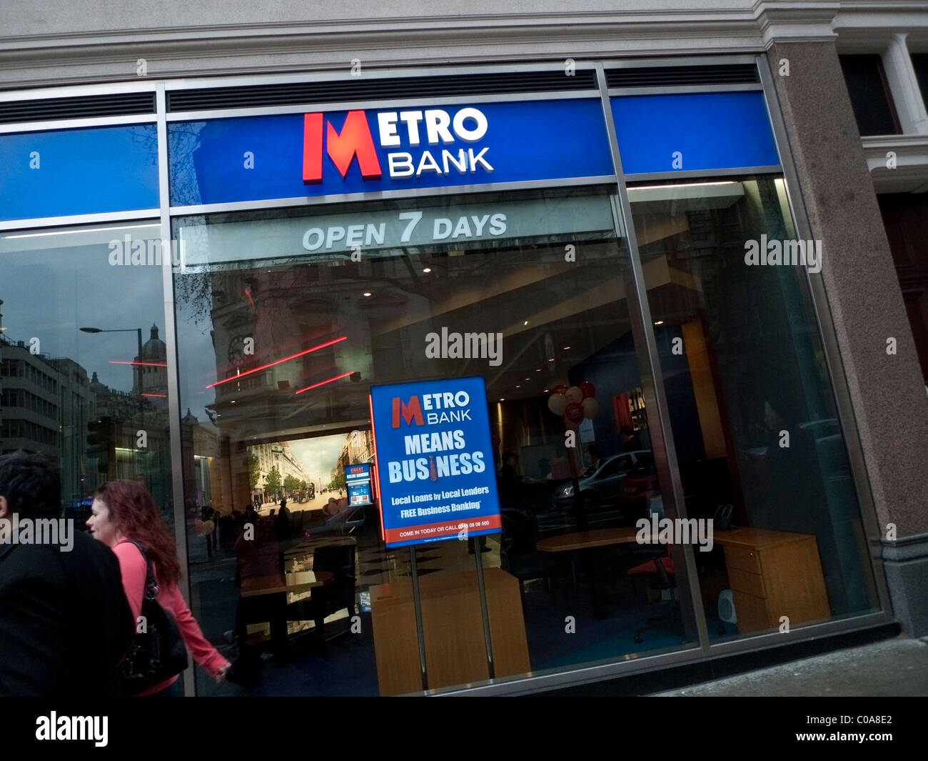 People walking past the new Metro Bank which is open 7 days a week ...