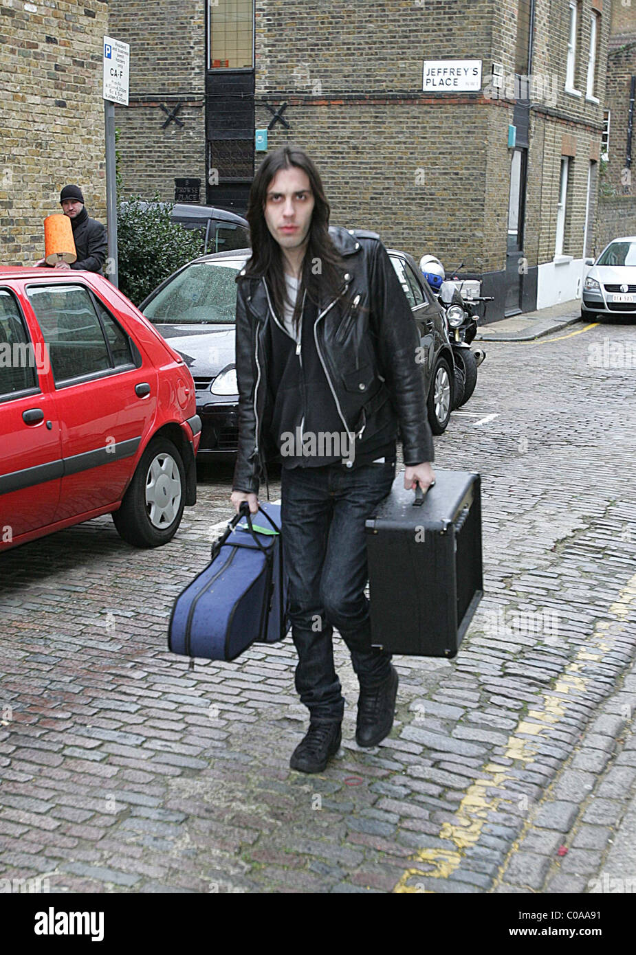 Blake Wood Arriving at Amy Winehouse's home with items needed for her ...