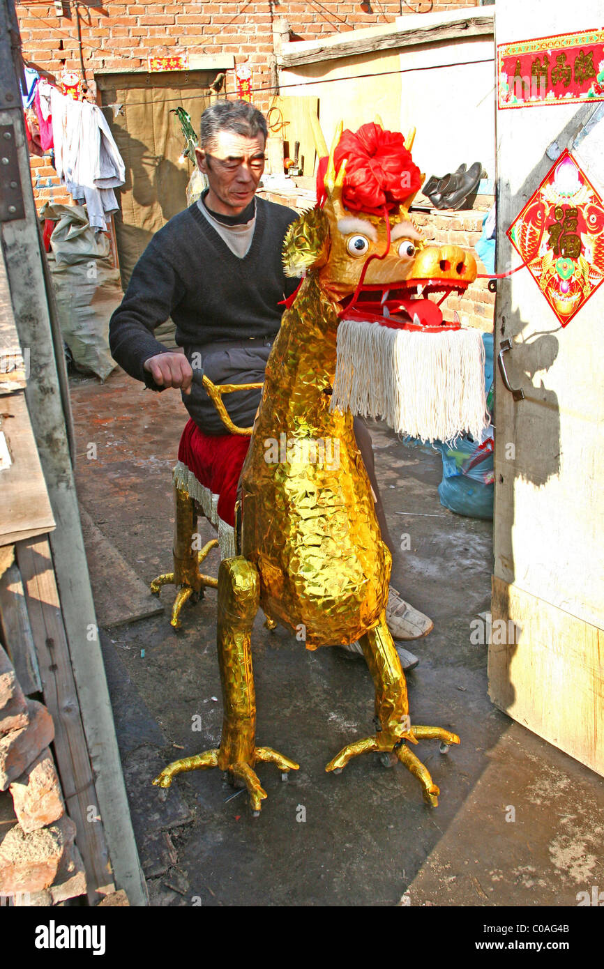 RUBBISH DRAGON This festive dragon is made entirely from scraps from ...
