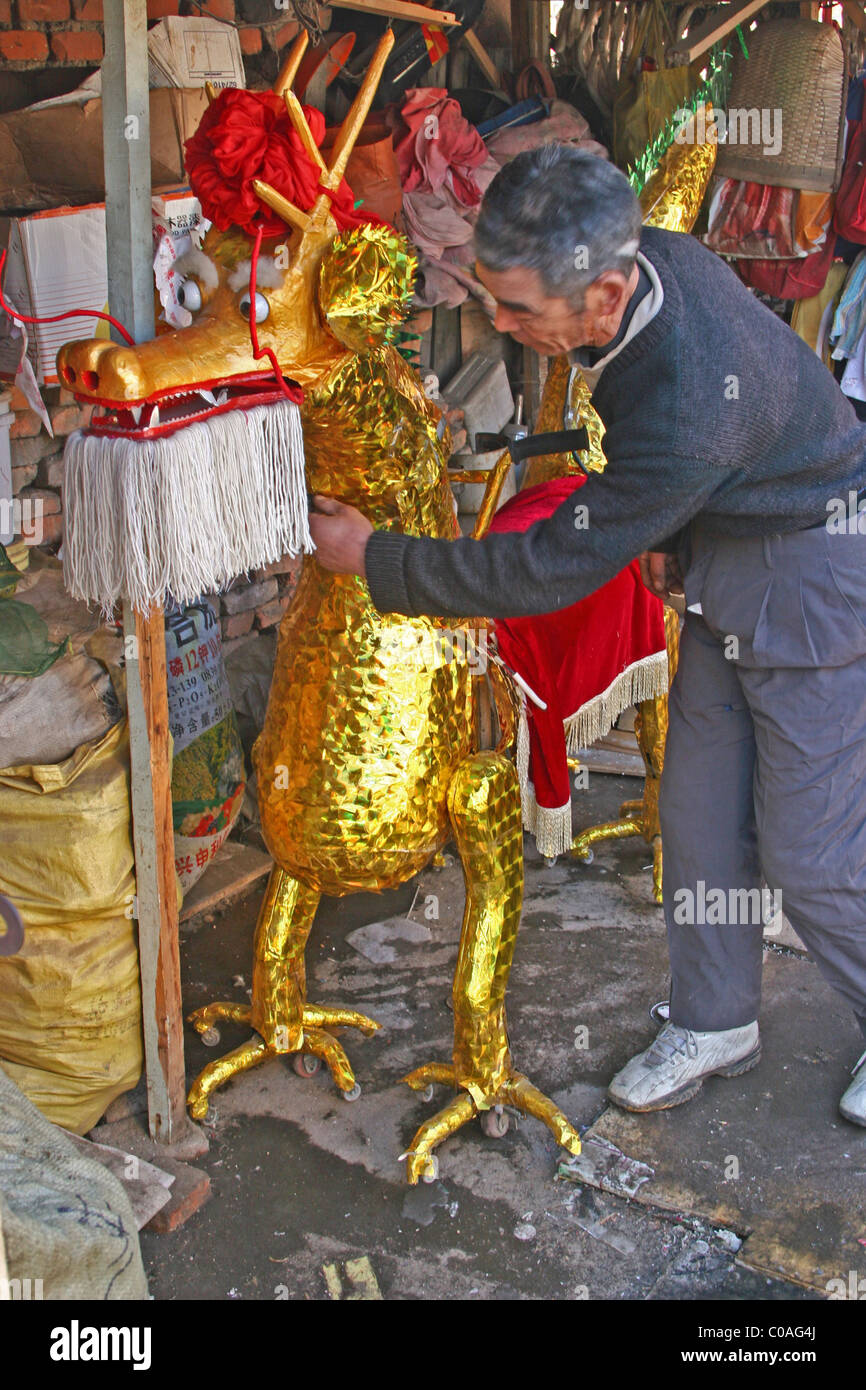 RUBBISH DRAGON This festive dragon is made entirely from scraps from ...