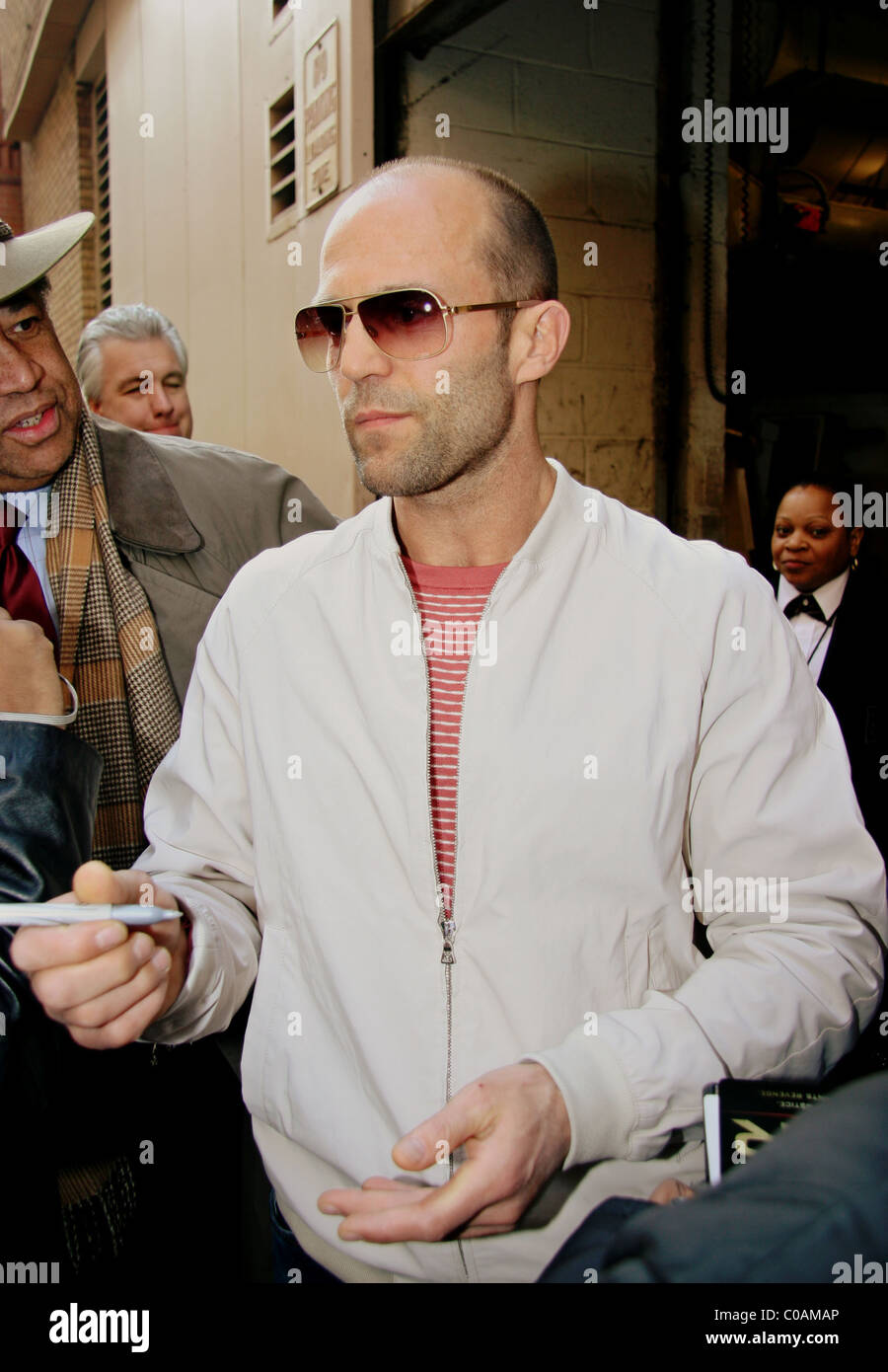 Jason statham signing autographs fans hi-res stock photography and ...