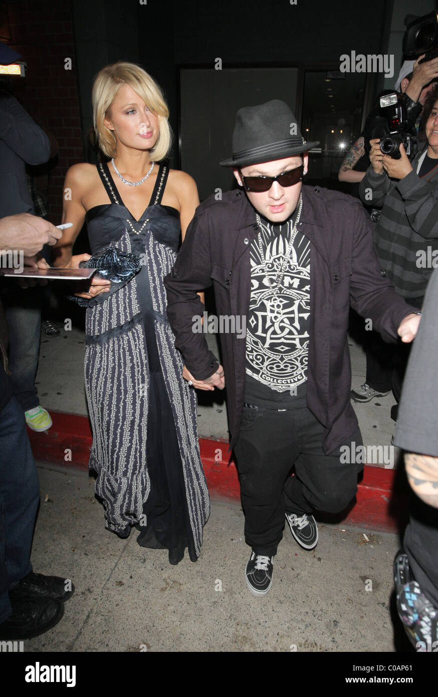 Paris Hilton and boyfriend rocker Benji Madden leaving Mr Chow after ...