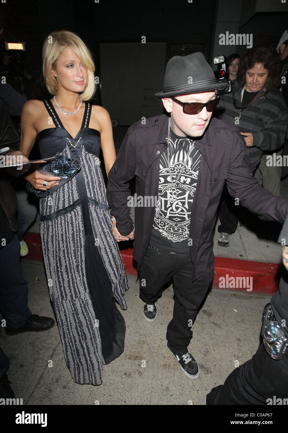 Paris Hilton and boyfriend rocker Benji Madden leaving Mr Chow after ...