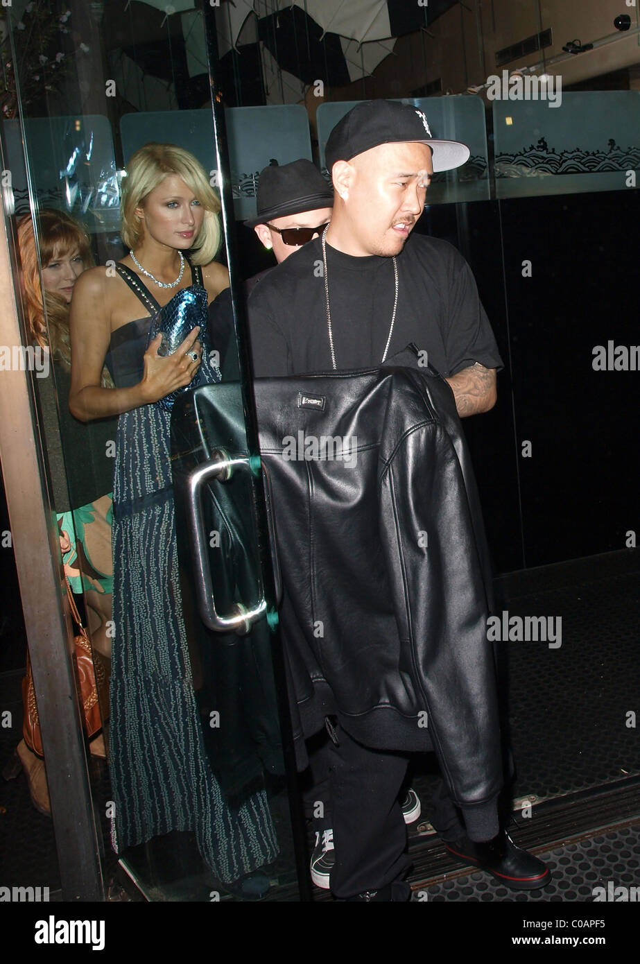 Paris Hilton and boyfriend rocker Benji Madden leaving Mr Chow after ...