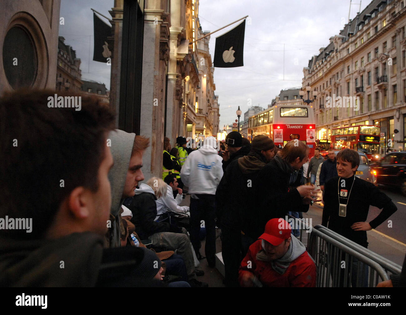 Prospective iPhone customers are queuing up in front of Apple's ...