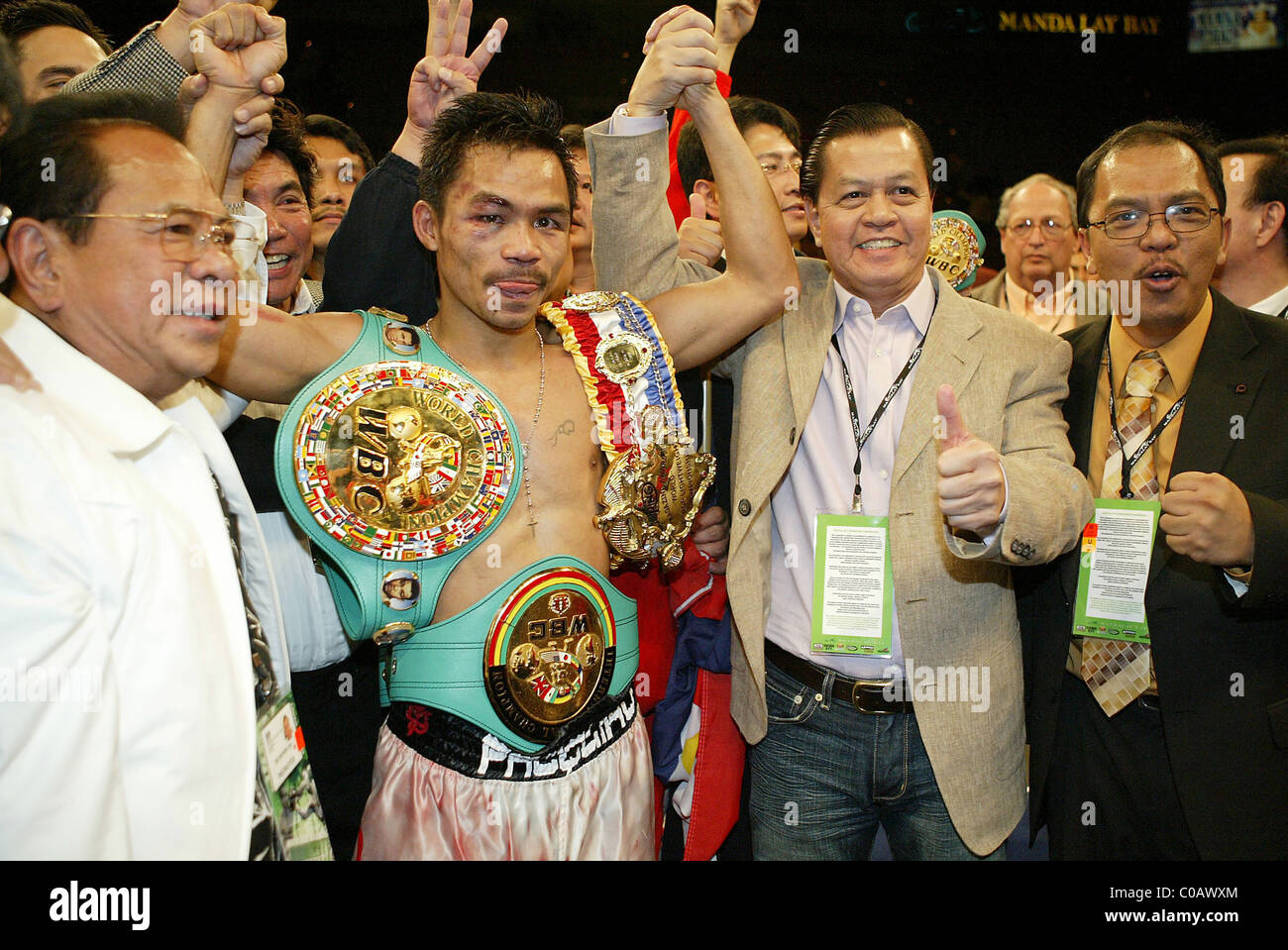 Manny Pacquiao poses for winning shot with his team. Pacquiao won the ...