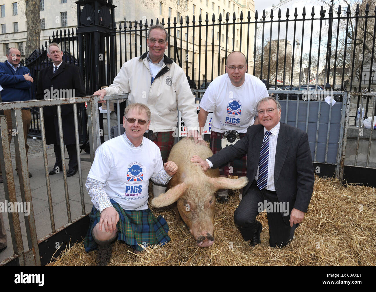 Malcolm Bruce, MP for Gordon with pig farmers and Winnie the pig Pig ...