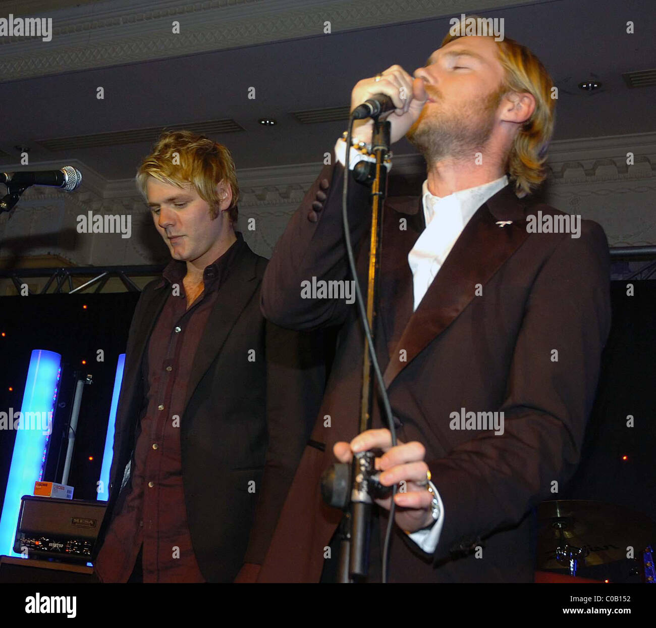 Brian McFadden and Ronan Keating performing at the Maire Keating ...