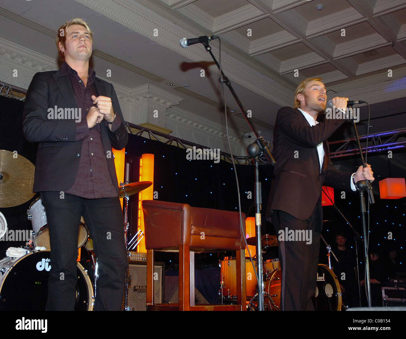 Brian McFadden and Ronan Keating performing at the Maire Keating ...