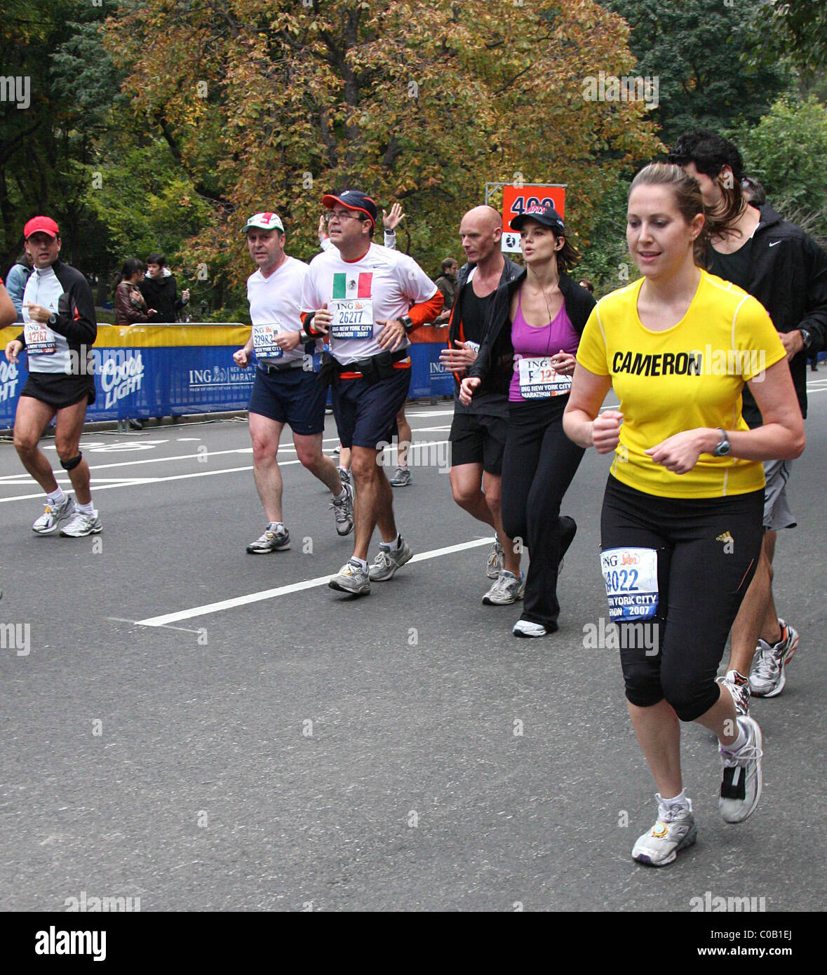 Katie Holmes running towards the finish line in her first NYC Marathon ...