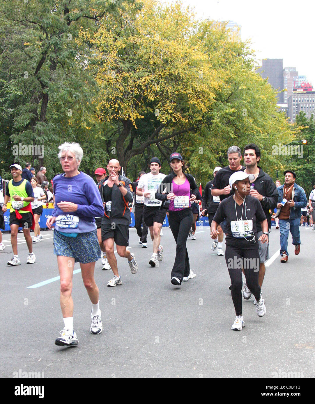 Katie Holmes running towards the finish line in her first NYC Marathon ...