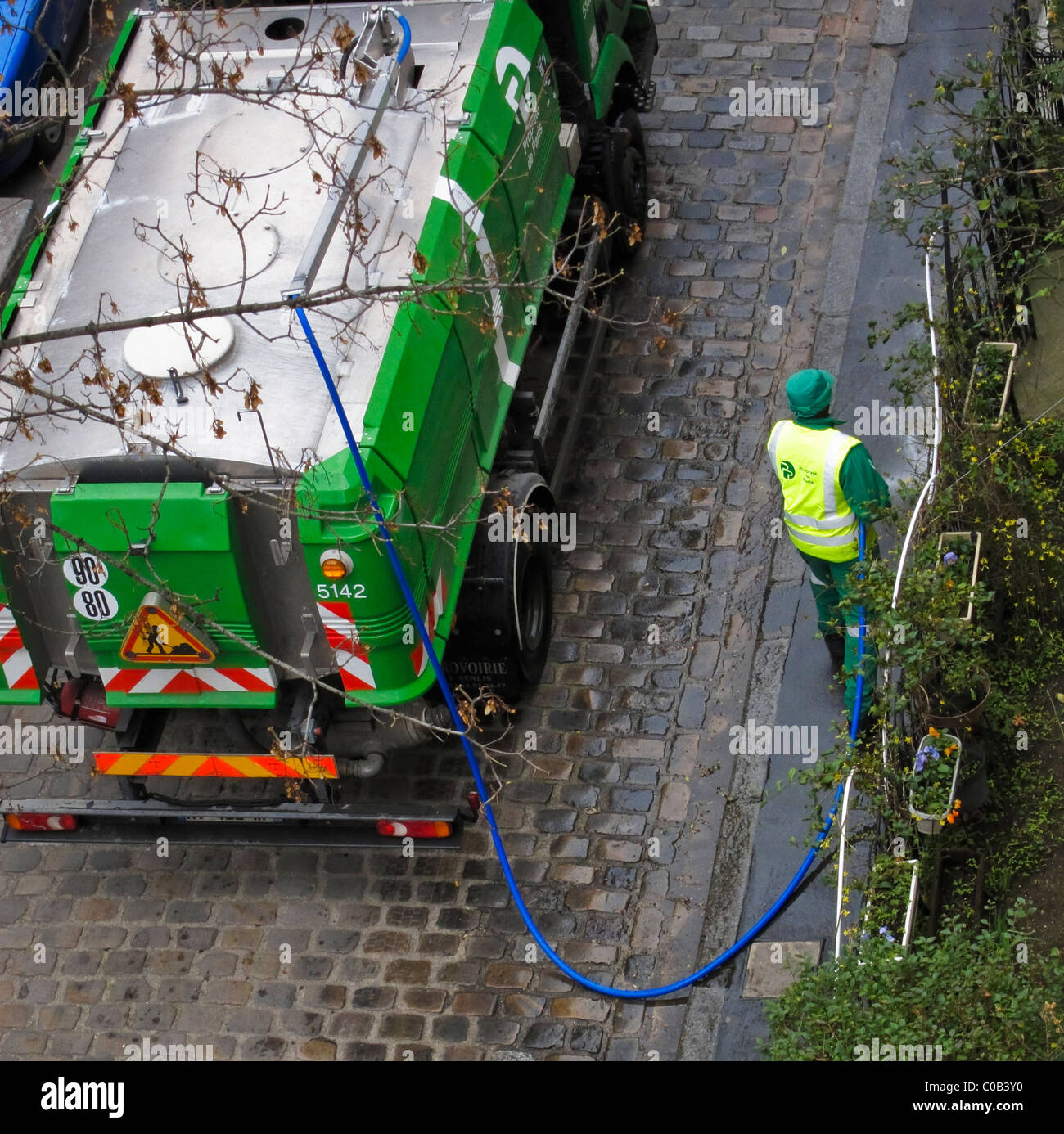 Paris, France, Street Cleaner Cleaning Street, High Angle, Cobbled ...