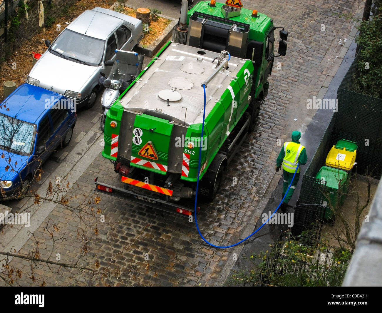 Paris, France, Street Cleaner Cleaning Street, High Angle, Cobbled ...