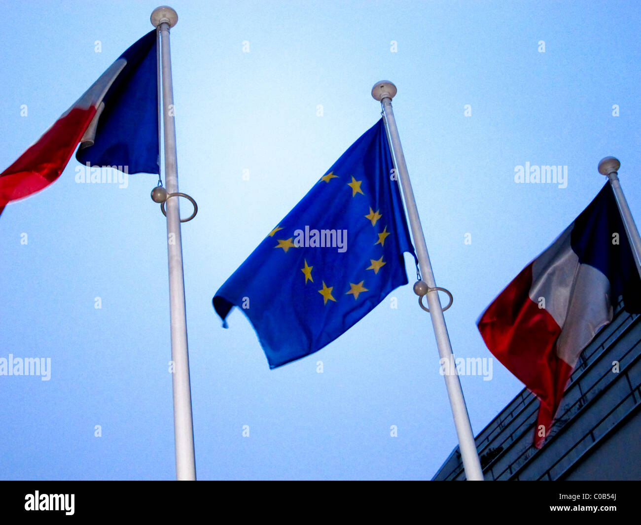 Paris, France, French and European Flags Outside at Dusk Stock Photo ...
