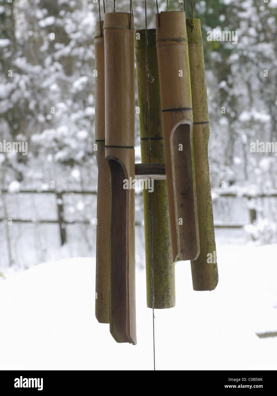 windchimes snow garden winter Stock Photo - Alamy