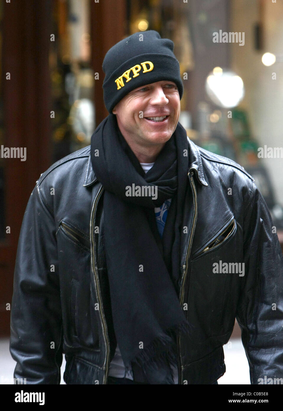 Bruce Willis spends his morning out in London. The action star browses ...