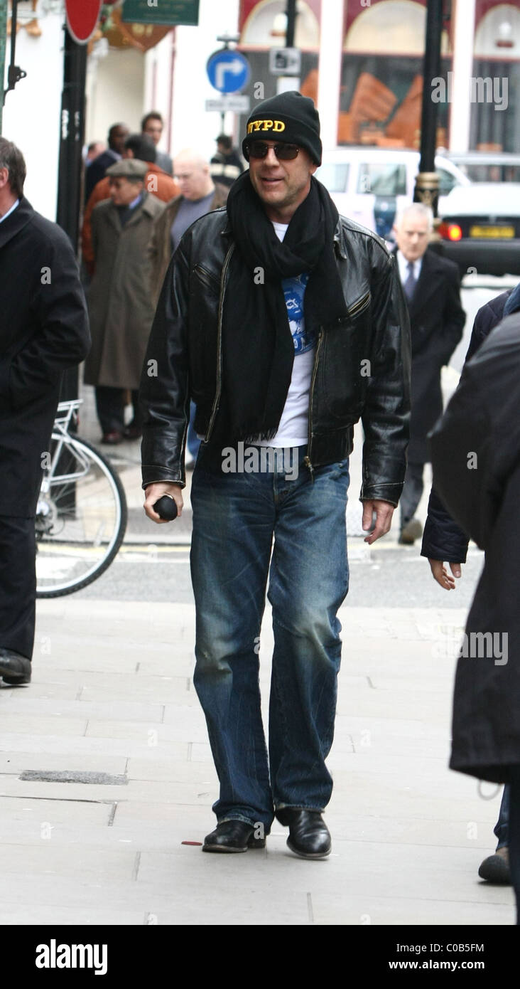 Bruce Willis spends his morning out in London. The action star browses ...