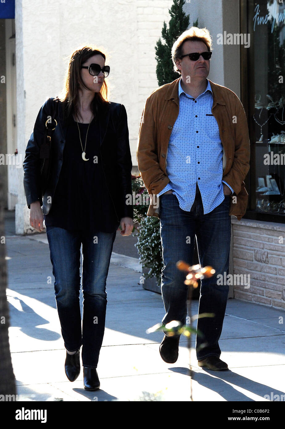 Greg Proops walks with his wife Jennifer Canaga after having lunch ...