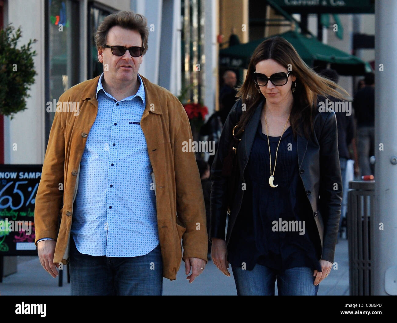 Greg Proops walks with his wife Jennifer Canaga after having lunch ...
