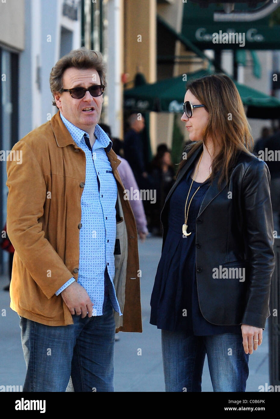 Greg Proops talks to his wife Jennifer Canaga after having lunch ...