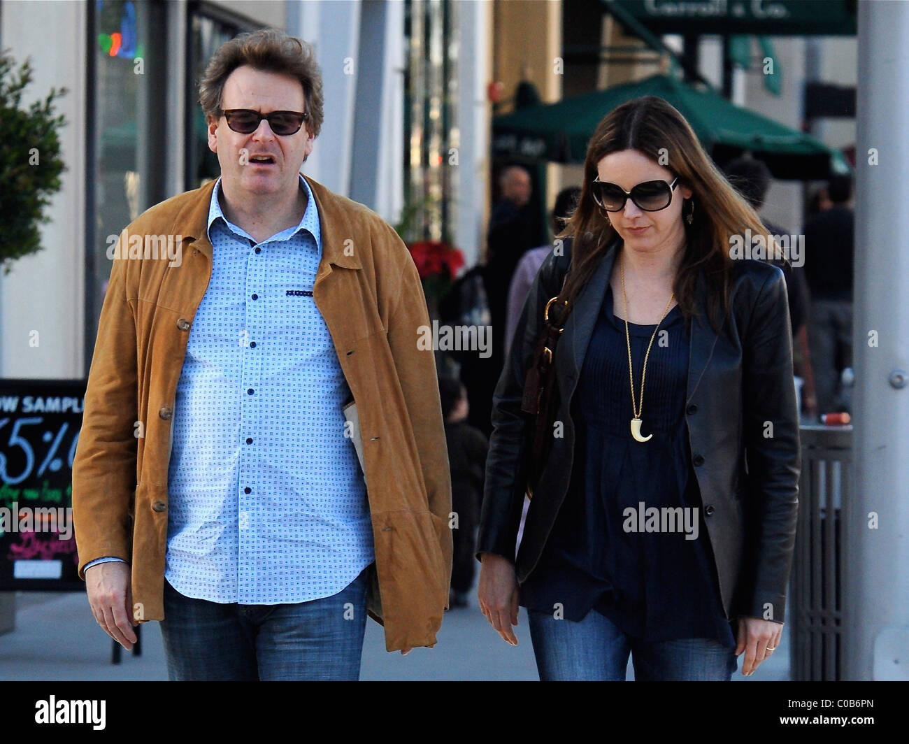 Greg Proops walks with his wife Jennifer Canaga after having lunch ...