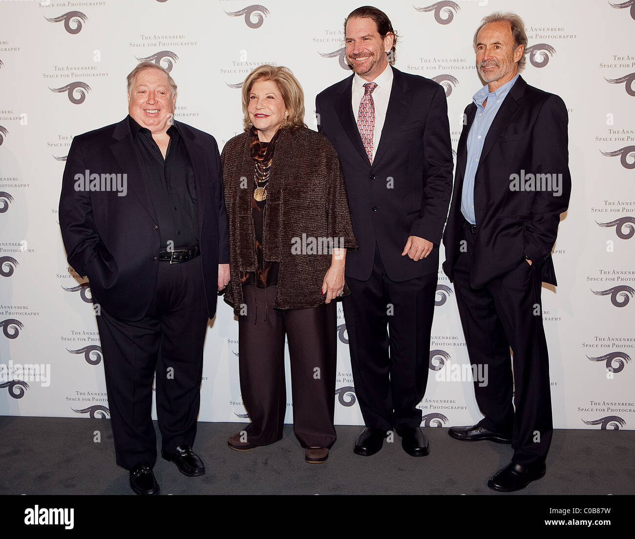 Walter Iooss and Neil Leifer stand with Wallis and Son, Charles ...