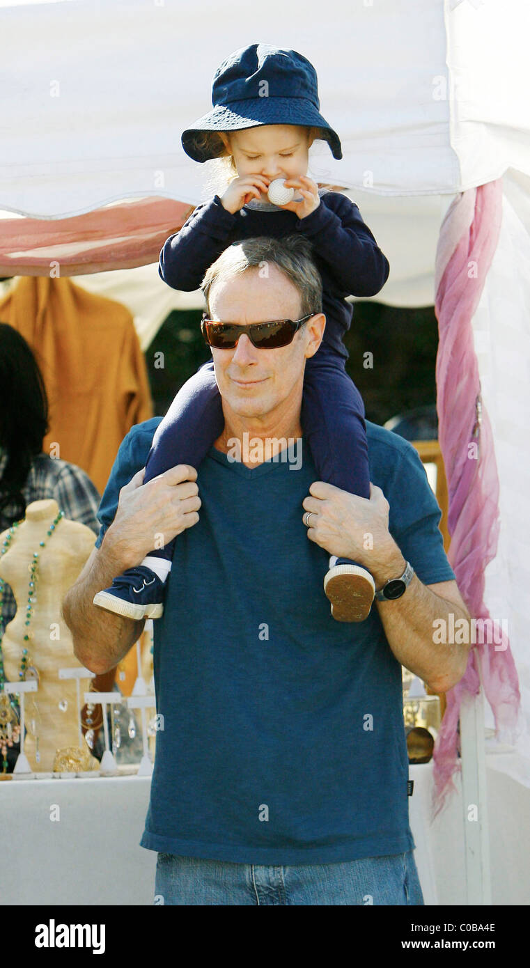 Tom Mahoney visits a farmers market in Brentwood with his twin daughter ...