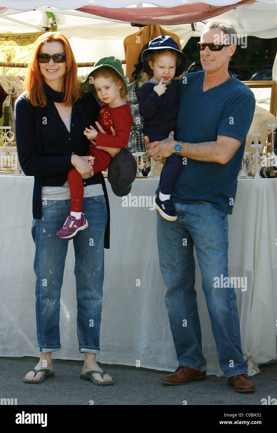 Marcia Cross visits a farmers market in Brentwood with her twin ...