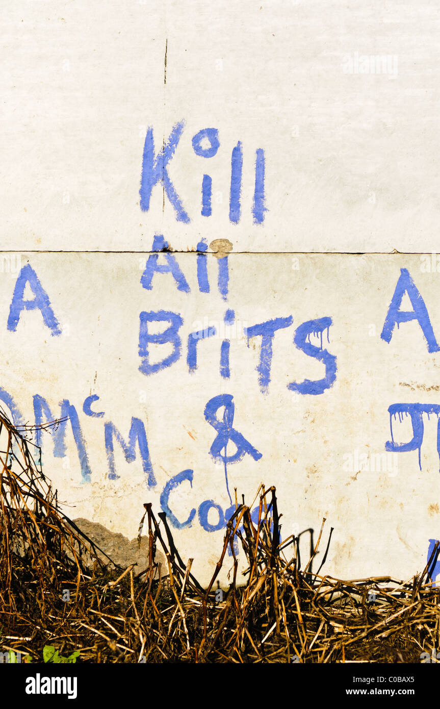 Graffiti on a wall in Belfast "Kill all Brits and Cops Stock Photo - Alamy