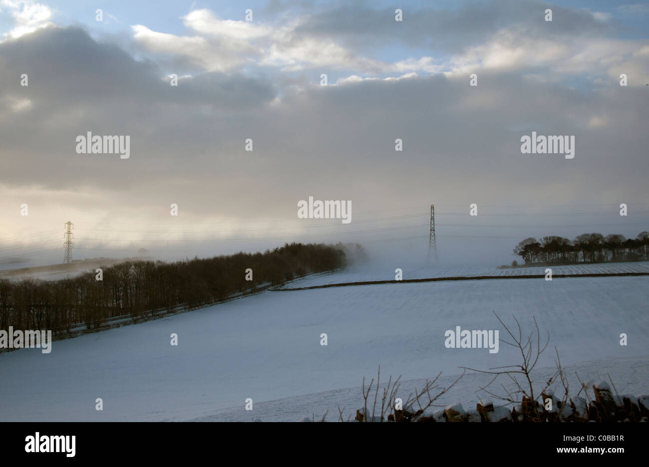 Pylons in the mist hi-res stock photography and images - Alamy