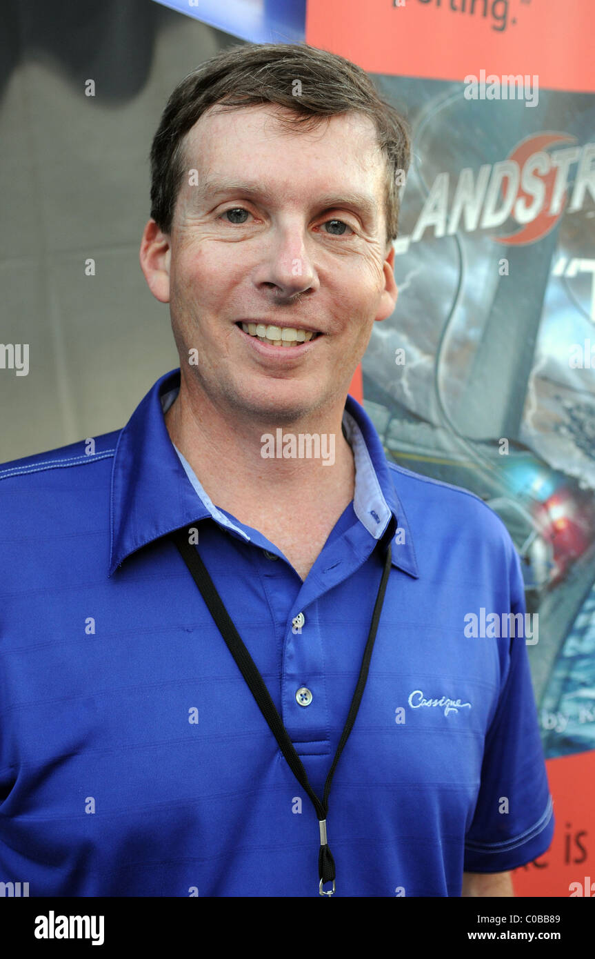 Author Ken Bass signing his book 'LandStrike' during the 26th edition ...