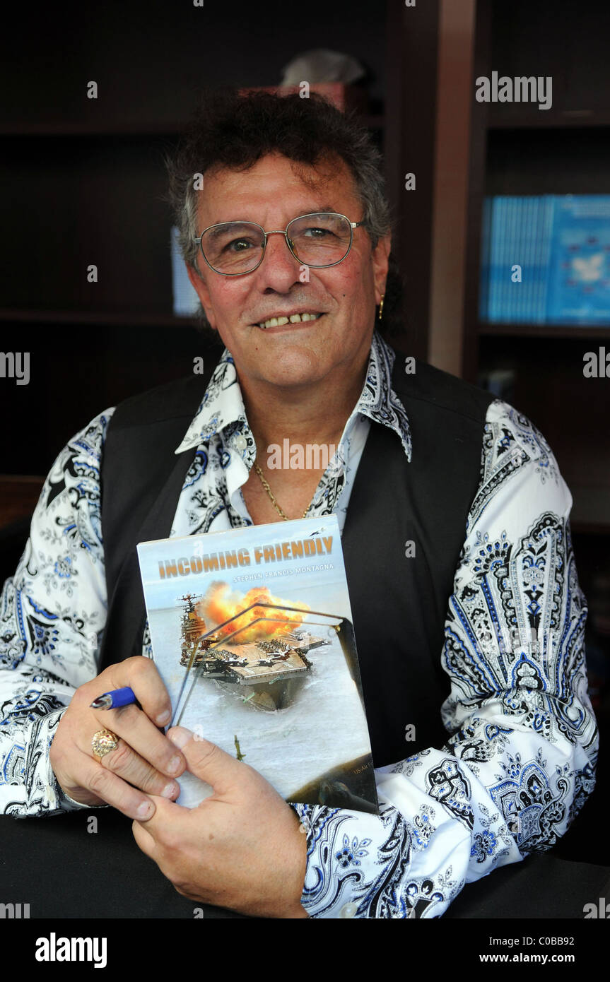 Author Stephen Francis Montagna signing his book 'Incoming Friendly ...