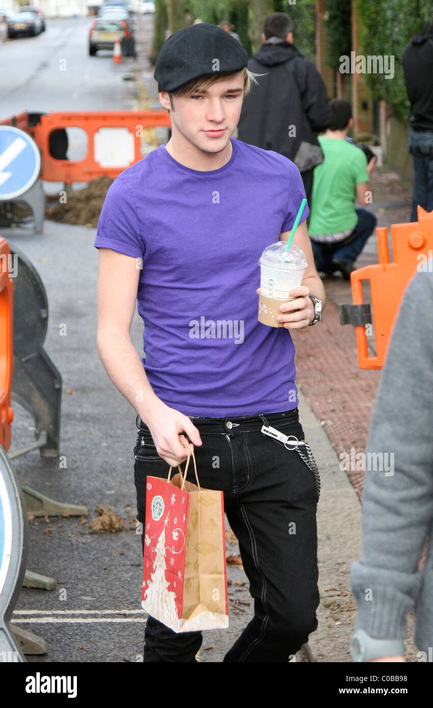 Lloyd Daniels outside the 'X Factor' house carrying a Starbucks London ...