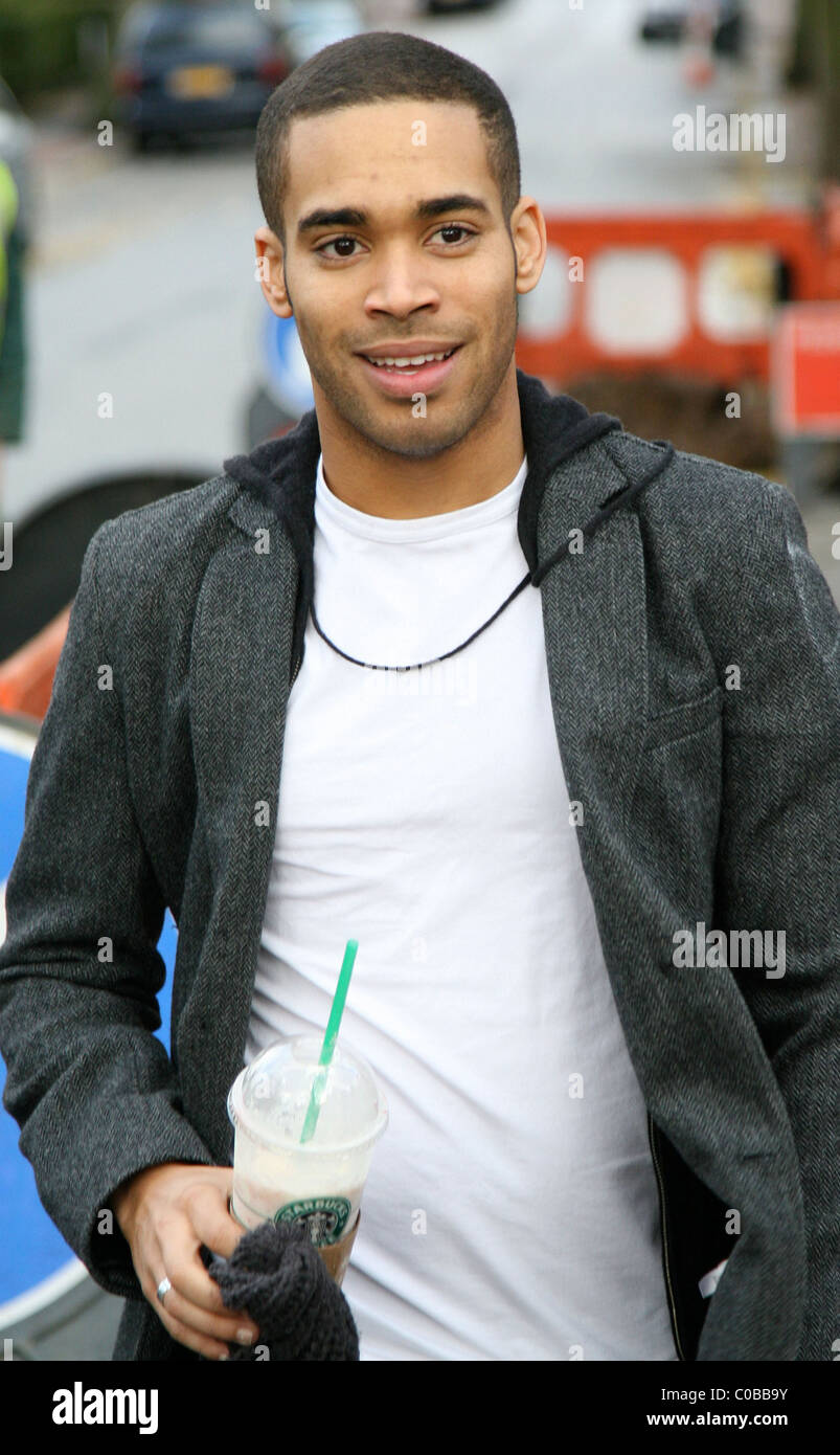 Danyl Johnson outside the 'X Factor' house carrying a Starbucks London ...
