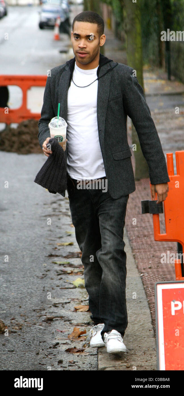 Danyl Johnson outside the 'X Factor' house carrying a Starbucks London ...