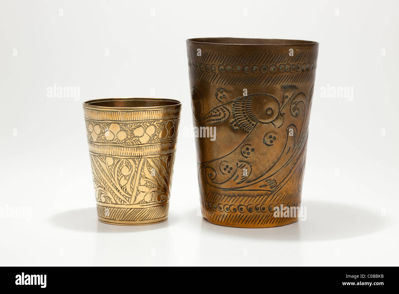 Two brass vintage spirit drinking containers Stock Photo - Alamy